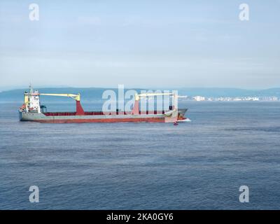 Bulk carrier cargo ship leaving passing Penarth Wales UK, on the Severn ...
