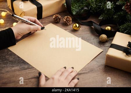 Christmas female desk with blank paper note, keyboard, and new year ...