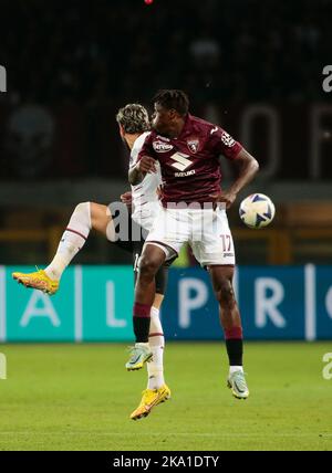 Stephane Singo of Torino FC and Theo Hernandez of AC Milan during the ...