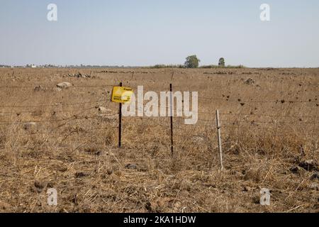 minefield warning sign in Hebrew, English and Arabic, Golan Heights ...