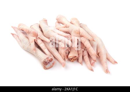 Raw chicken feet isolated on white background Stock Photo - Alamy