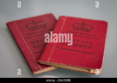 Red linen bound Uk Driving Licence early 1970's Stock Photo - Alamy