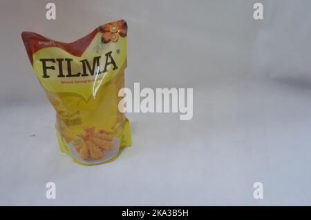 Filma packaged cooking oil on a white background Stock Photo - Alamy