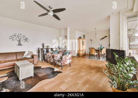 Simple expensive interior of living room with carpet and beige sofa ...
