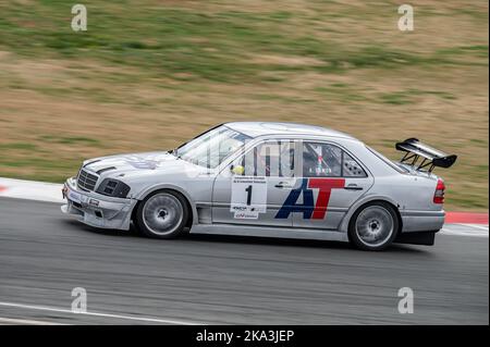 Mercedes AMG W202 DTM on the race track Stock Photo - Alamy