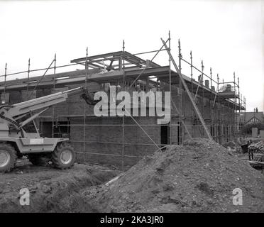 A construction crane is seen outside the White House Jan. 14, 2026 ...