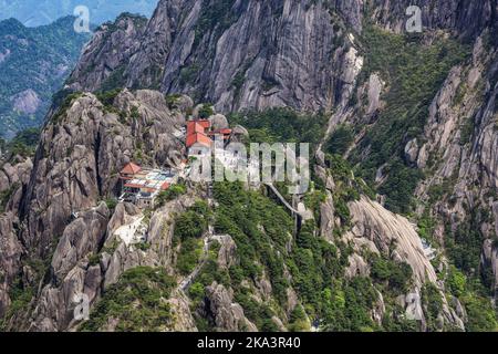 A scenic view of Huangshan mountain covered with trees in Anhui, China ...