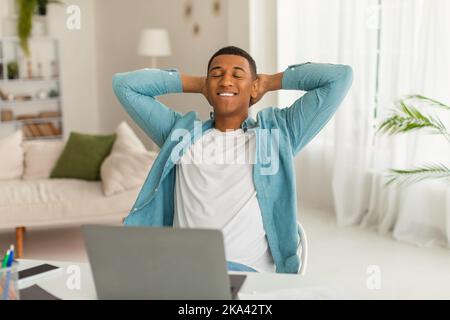 Man resting at work in video surveillance room Stock Photo - Alamy