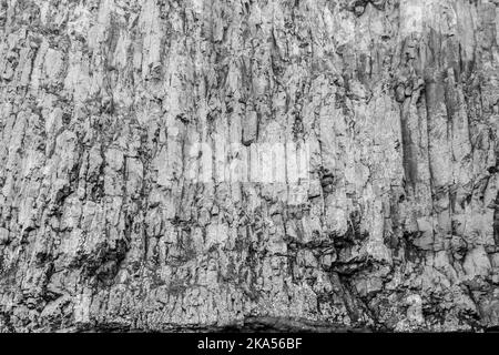 Close up on jagged cliff, with exposed rock in the cliff face Stock ...