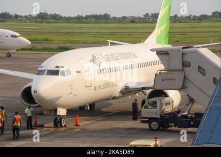 View of Garuda Indonesia Citilink airliner on runway at Juanda ...