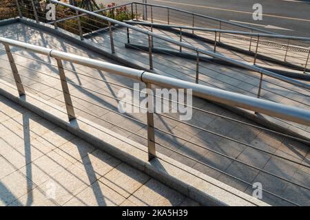 A wheelchair ramp, an inclined plane installed in addition to or ...