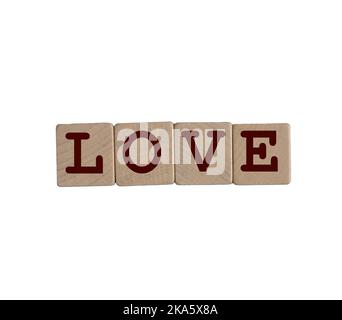 I Love U word written on wood block on pink red background with copy ...