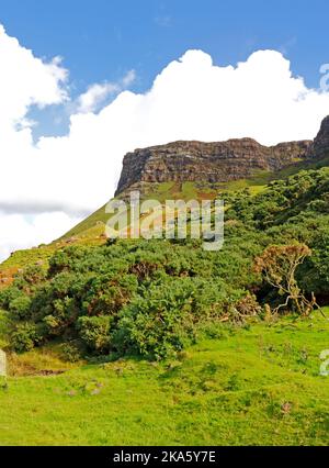 A view of the geologically important cliffs of Gribun with waterfall at ...