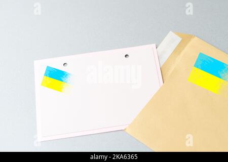Ukraine flag on craft envelope letter. National invitation concept ...