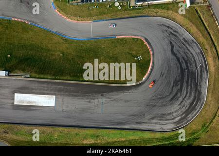 luxury cars racing track. Aerial photograph from drone Stock Photo - Alamy