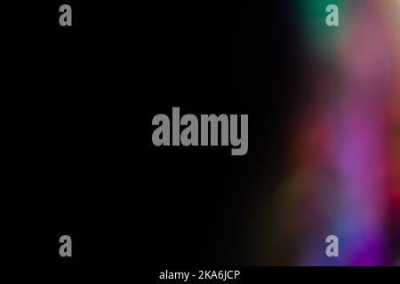 Rainbow holographic bokeh background. Multicolored overflows of color ...