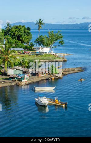 Fishing village set on foreshore of Milne Bay, Alotau, Papua New Guinea ...