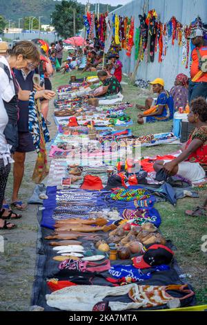 Cruise ship tourists buying goods at open air market on street outside ...