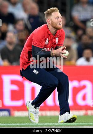 England's Ben Stokes catches out Australia's Mitchell Starc during ...