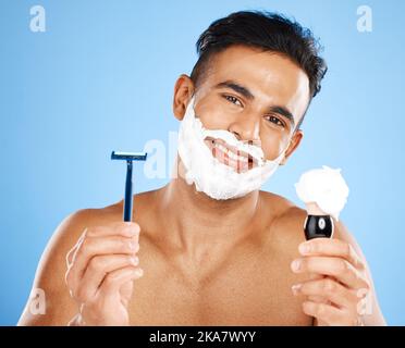 men holding a razor against white wall Stock Photo - Alamy