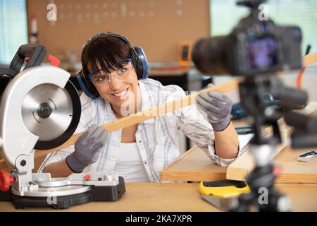 female diy blogger recording video of woorworking hobby Stock Photo - Alamy