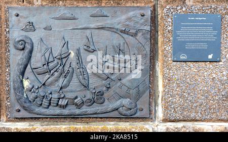 Heritage plaque by Sue Webber on the Quay Wall at Minehead depicting ...