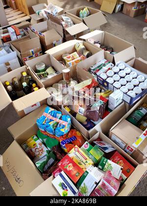 Food humanitarian aid for Ukraine sorted in parcels before send out to ...