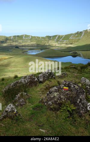 A scenic view of the beautiful Caldeirao Lagoon at Corvo Island in ...