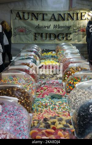 Christmas market stall selling fudge and toffee Stock Photo - Alamy