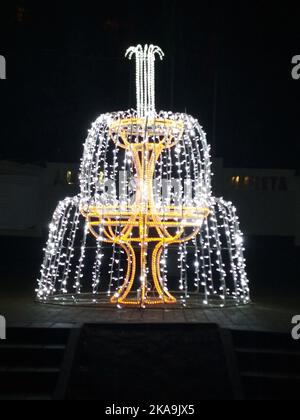 Light Christmas Figures Carriage Snowman Fountain made of garland lamps ...