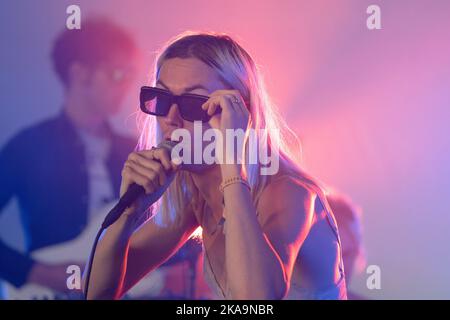 Bass player from Alice Low's band on the Rising Stage at Green Man 2022 ...
