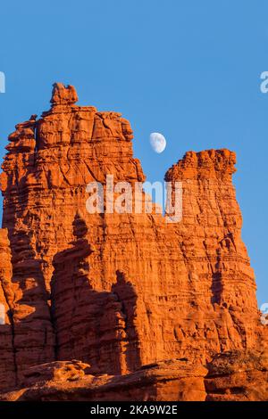 Rising moon by the Titan in the Fisher Towers, eroded Cutler sandstone ...
