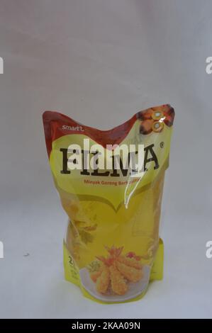 Filma packaged cooking oil on a white background Stock Photo - Alamy