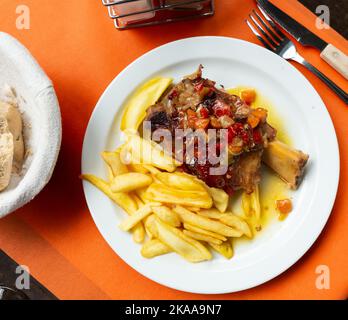 Codillo with French fries Stock Photo - Alamy