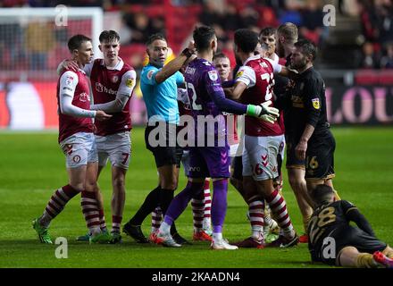 Tempers flare after Bristol City's George Tanner is shown a red card by referee George Tanner ...
