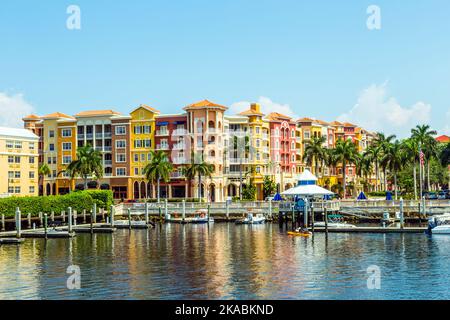 Colorful Spanish influenced buildings overlooking the water in tropical ...