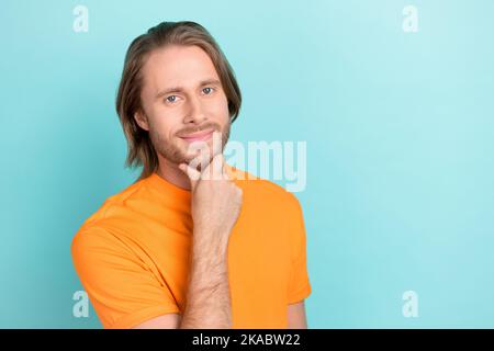 Photo of attractive male recommend you new online shop show phone touch ...