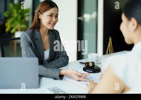 lawyers and clients are signing important contract documents Stock ...
