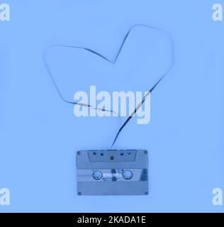 Transparent Cassette tape. Blue color background Stock Photo - Alamy