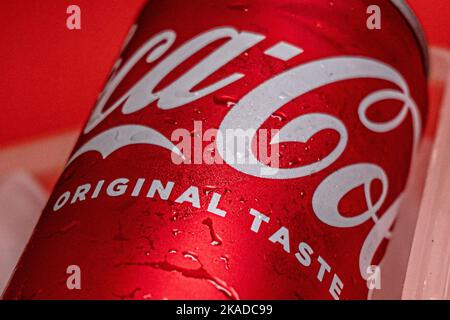 A closeup of Coca cola can under a light Stock Photo - Alamy