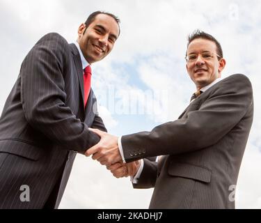 Professional collaboration between colleagues working together in an ...