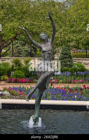 A vertical shot of a dancing lady sculpture in a Muriel Kauffman ...