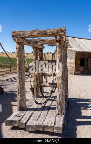 A sling frame or ox-shoeing stock used to support an ox for shoeing in ...