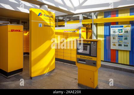 Postbank, financial center, ATM, packing station, stamps Stock Photo ...