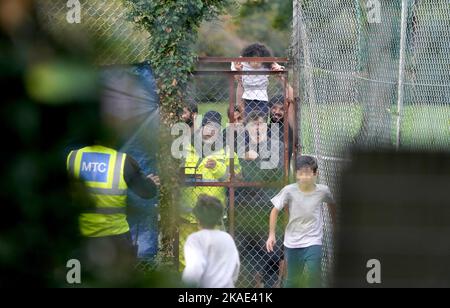 People thought to be migrants inside the Manston immigration short-term ...