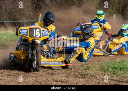 Josh Penfold, Dan Woodbridge racing in grasstrack motorcycle race ...