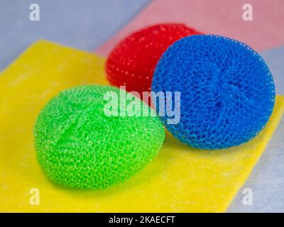 Colorful plastic scourer in a closeup Stock Photo - Alamy