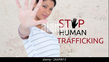 Composite of stop human trafficking text and caucasian woman showing ...