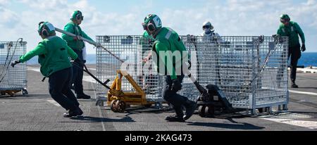 221030-N-UF592-1083 PHILIPPINE SEA (Oct. 30, 2022) Sailors transport ...