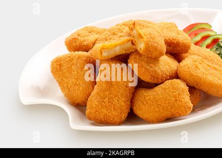 Fried chicken nuggets and sauce, isolated on light gray Stock Photo - Alamy